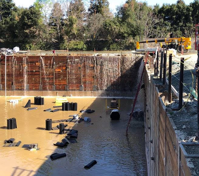 Sheared hydrant, massive flooding halts Stanford housing construction ...